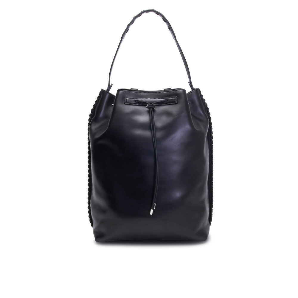 The Row - Black Leather Drawstring Backpack | Mitchell Stores